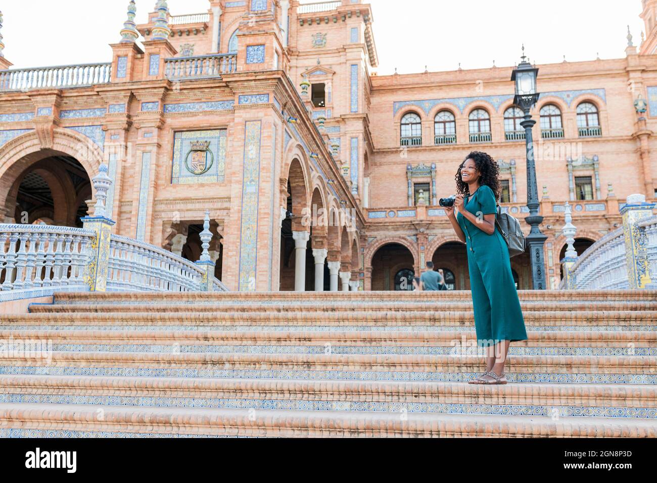 Young woman standing camera steps plaza de espana hi-res stock ...