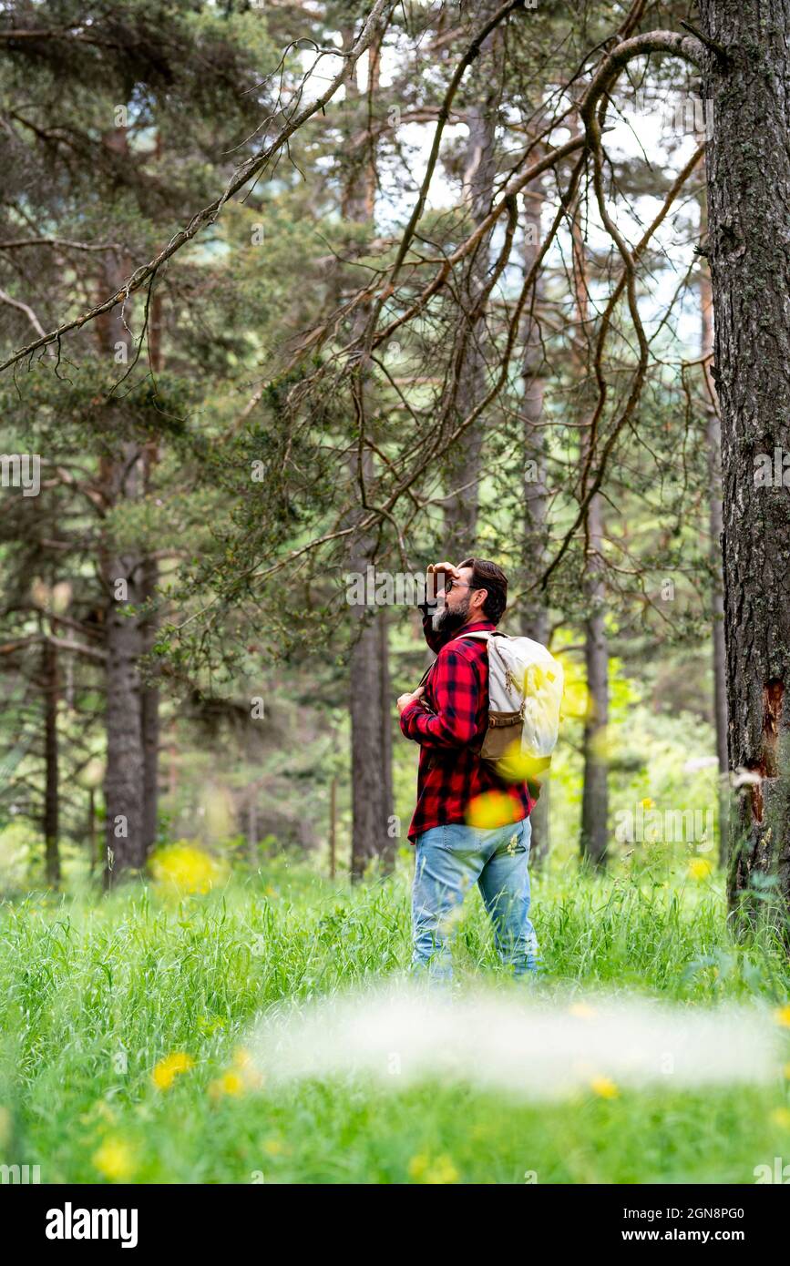 Man carrying tree trunk hi-res stock photography and images - Alamy
