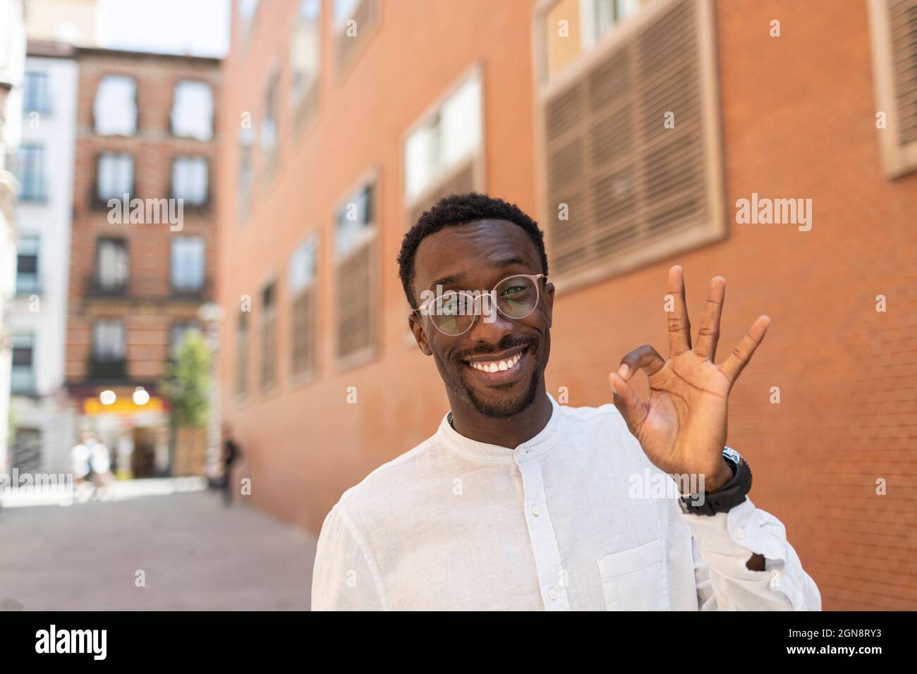 Ok sign young man on hi-res stock photography and images - Alamy