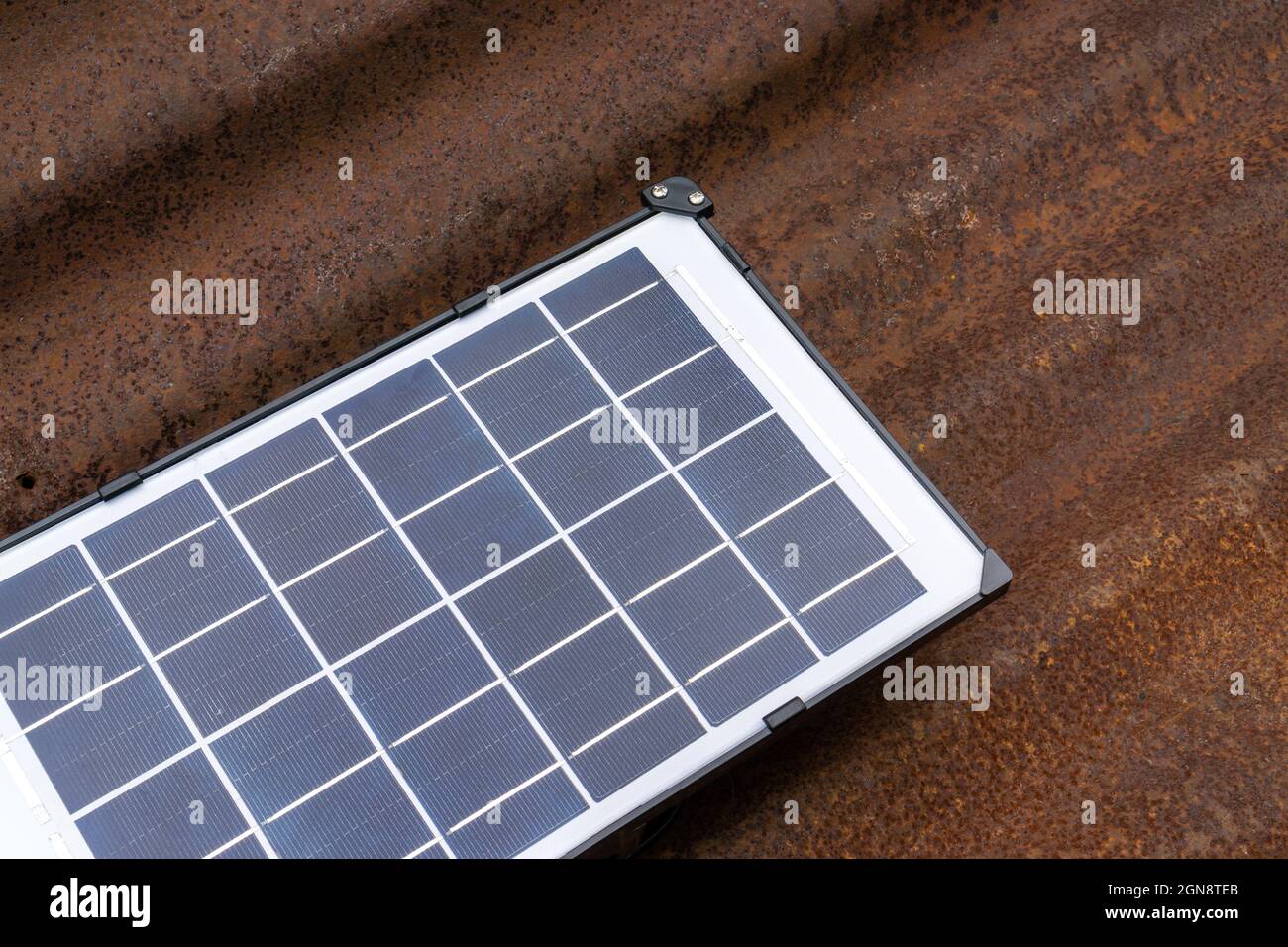 Small solar panel on rooftop. Renewable energy Stock Photo - Alamy