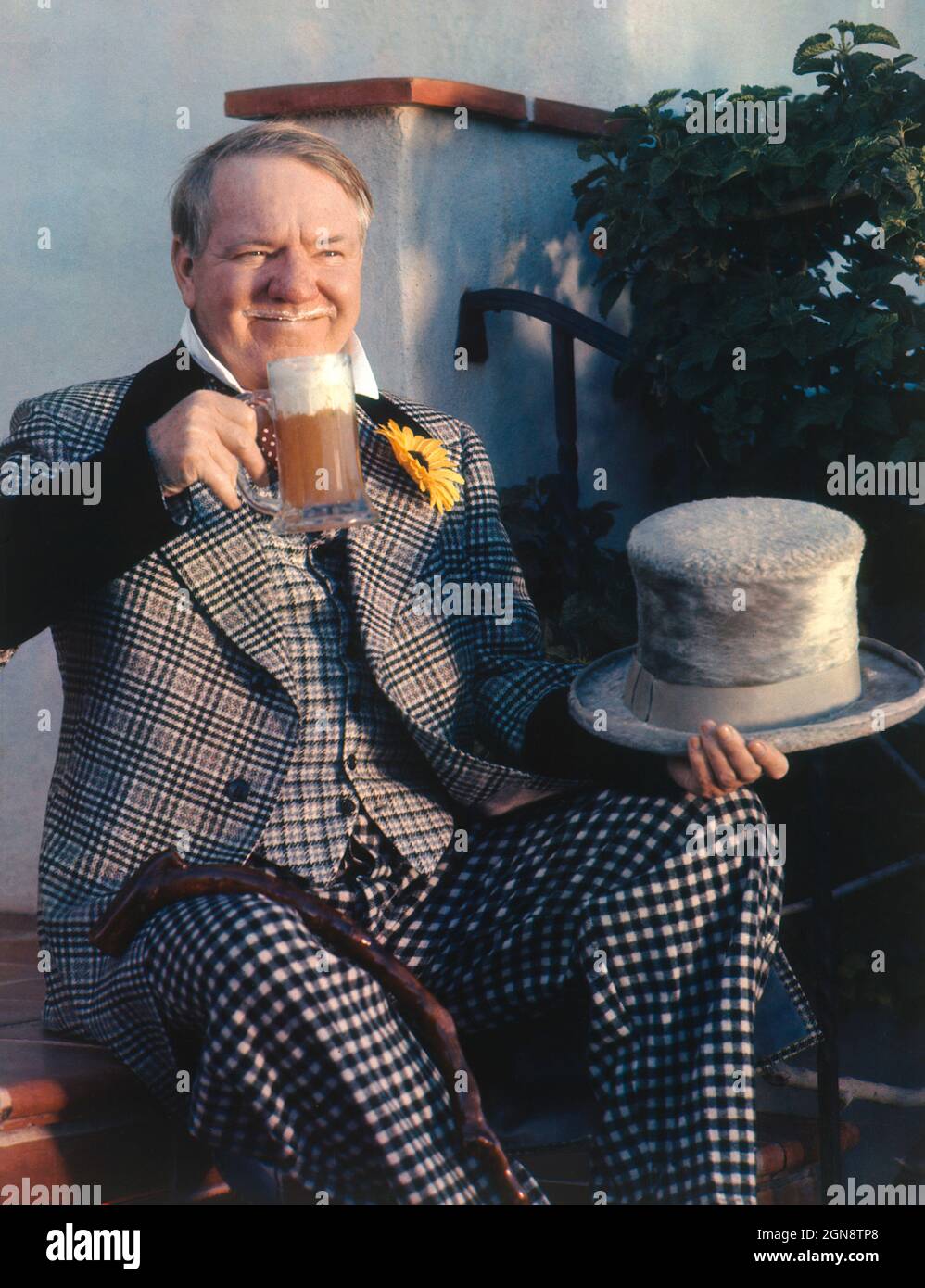 William Claude "W.C" Fields (1880-1946), American Comedian and Actor, seated Portrait drinking ...