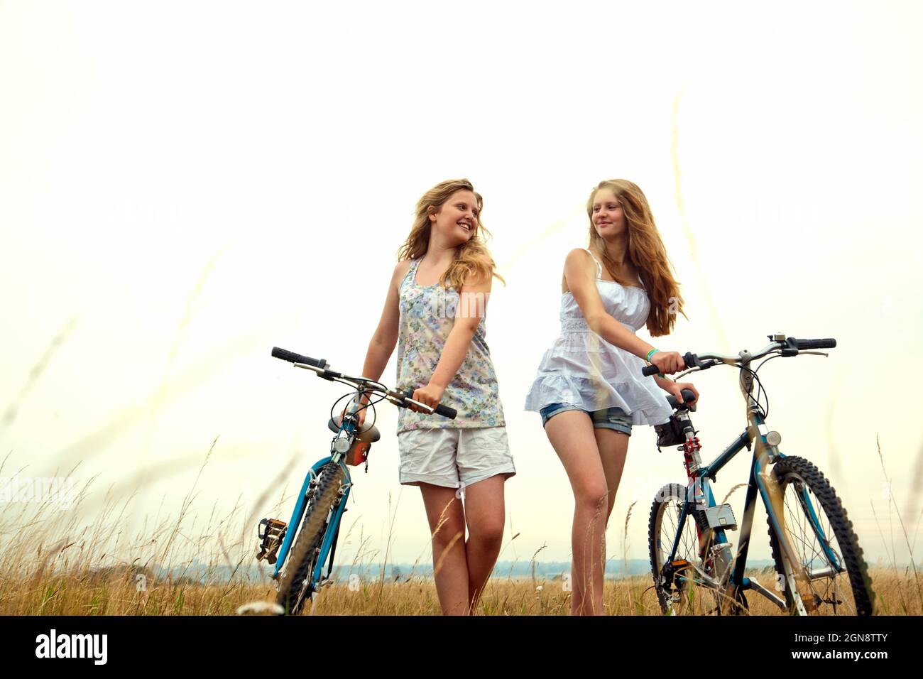 Three friends cycling hi-res stock photography and images - Alamy