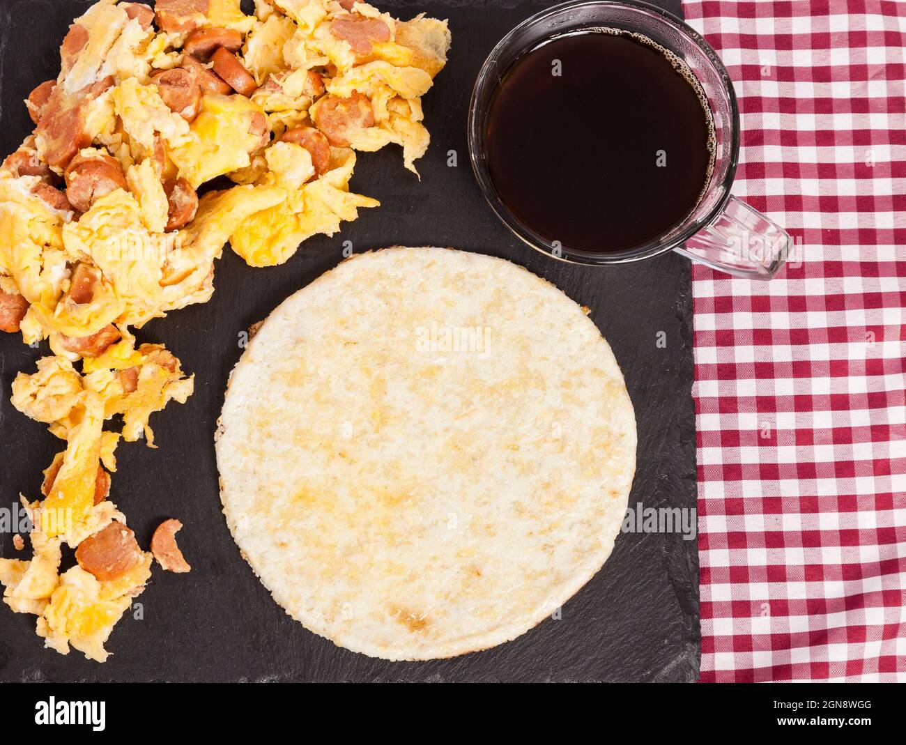 Traditional Latin American Breakfast; White Corn Arepa with Scrambled ...