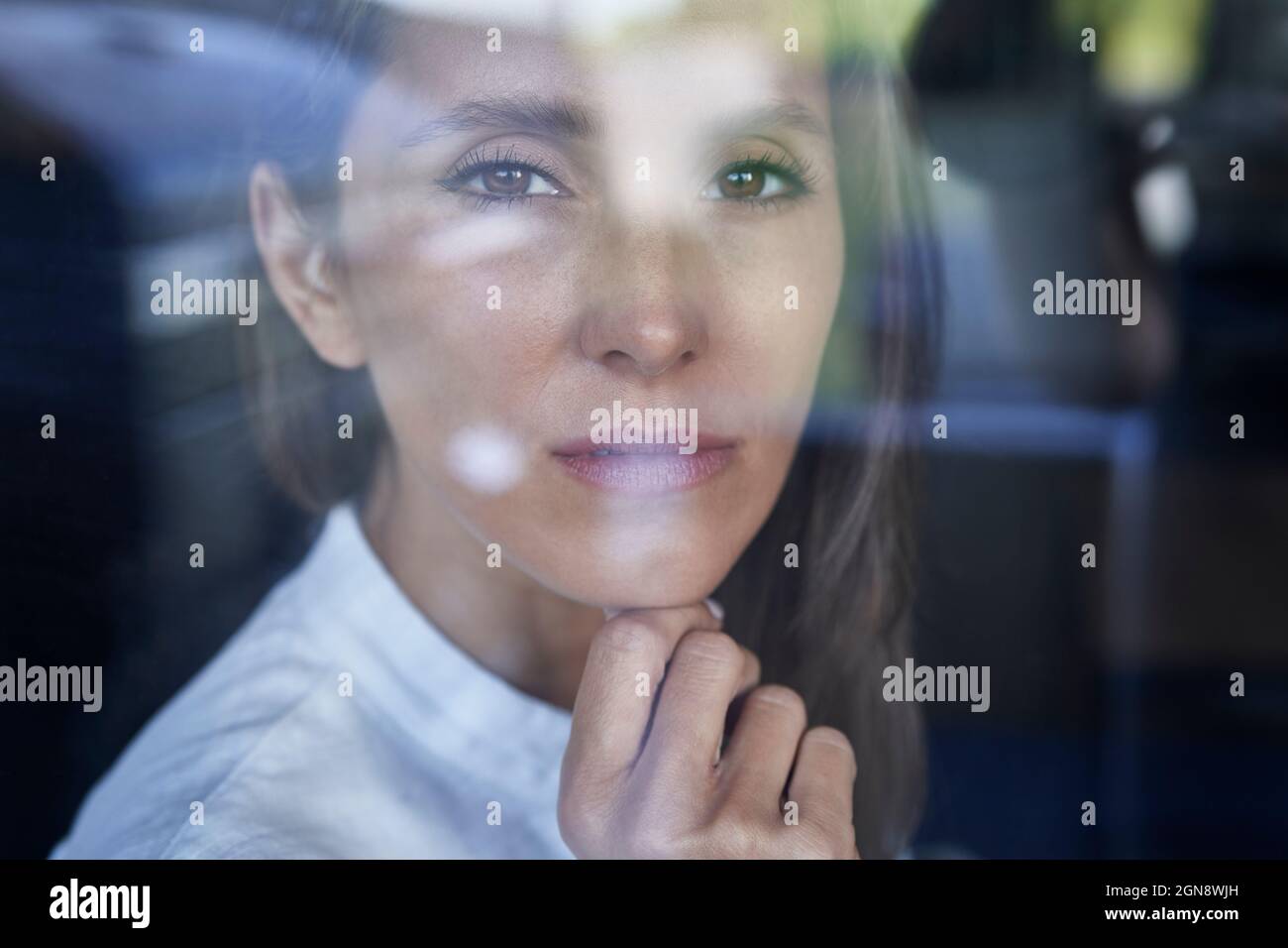 Woman face on transparent glass hi-res stock photography and images - Alamy