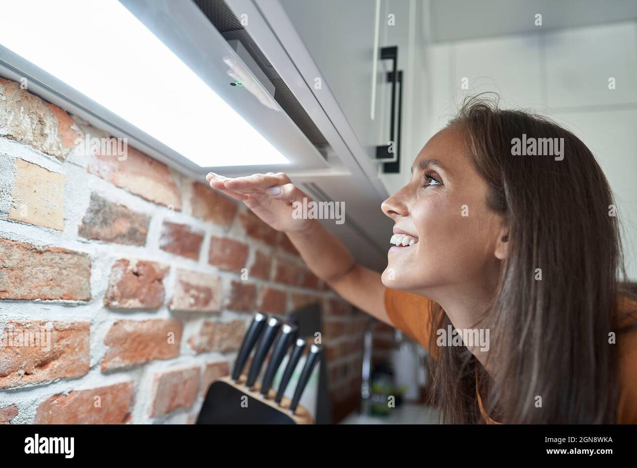 Modern kitchen with lights on hi-res stock photography and images - Alamy