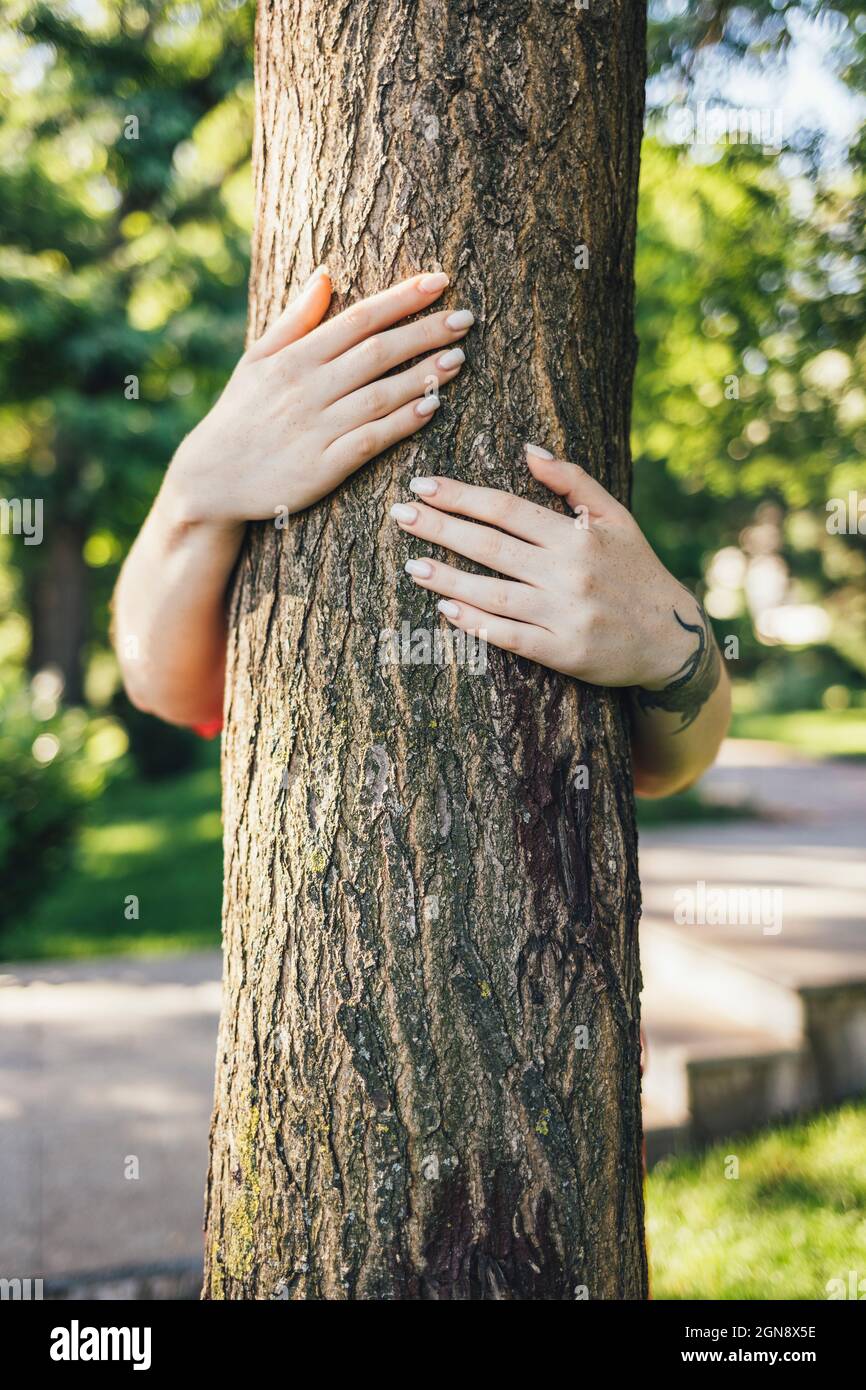 Hands hugging human hi-res stock photography and images - Alamy