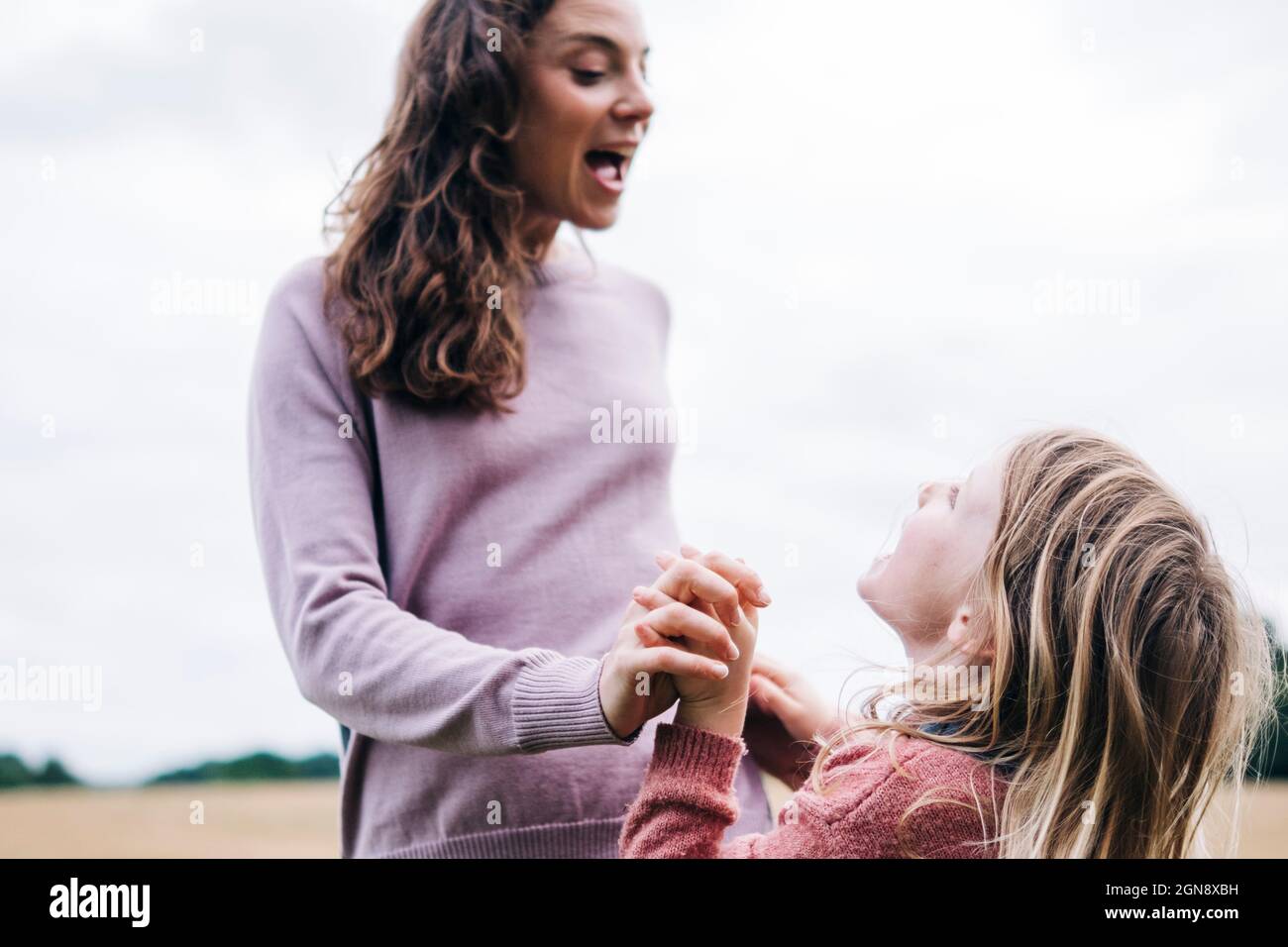 Child holding adults hand hi-res stock photography and images - Alamy