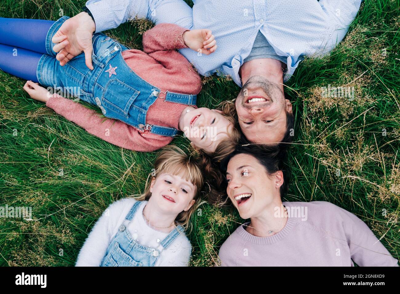 Cheerful family hi-res stock photography and images - Alamy