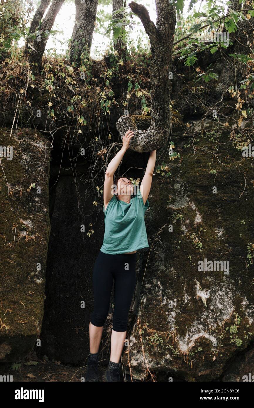 Holding branch hi-res stock photography and images - Alamy