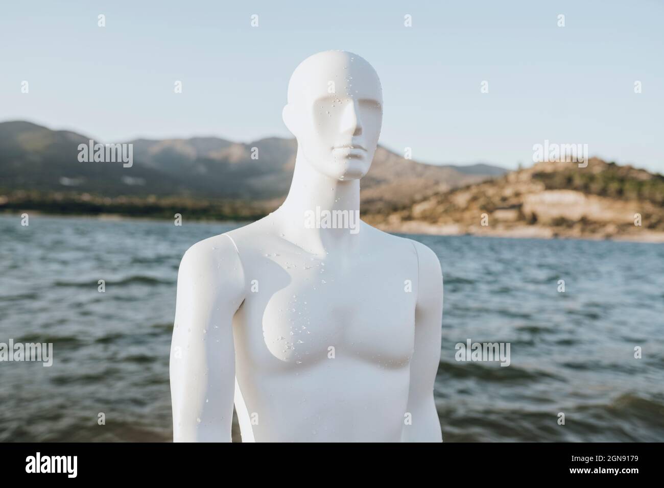 Robot standing at lakeshore Stock Photo - Alamy