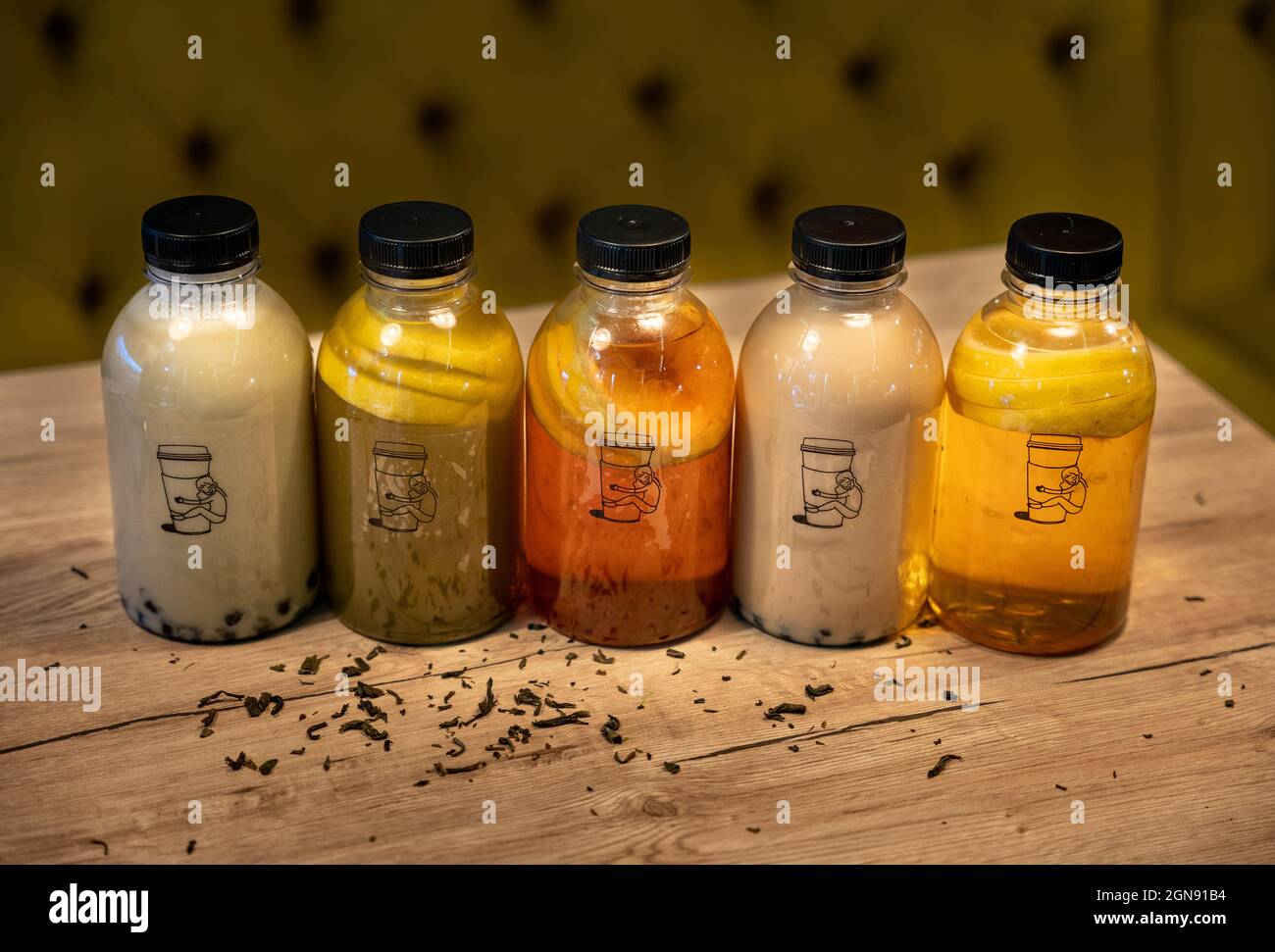 Different bottles of tea, bubble tea, lemon tea, coffee bubble tea and ...