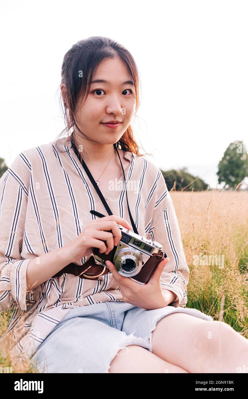 Young asian woman vintage hi-res stock photography and images - Alamy