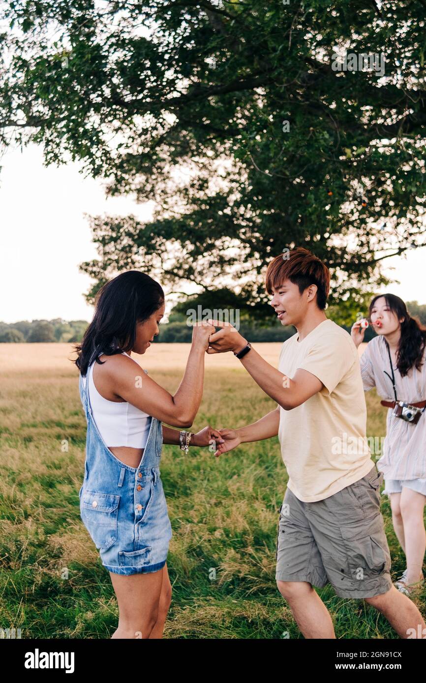 Women dancing together not smiling hi-res stock photography and images ...