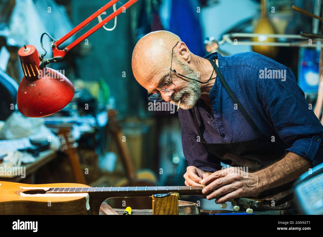 Luthier working on guitar hi-res stock photography and images - Alamy