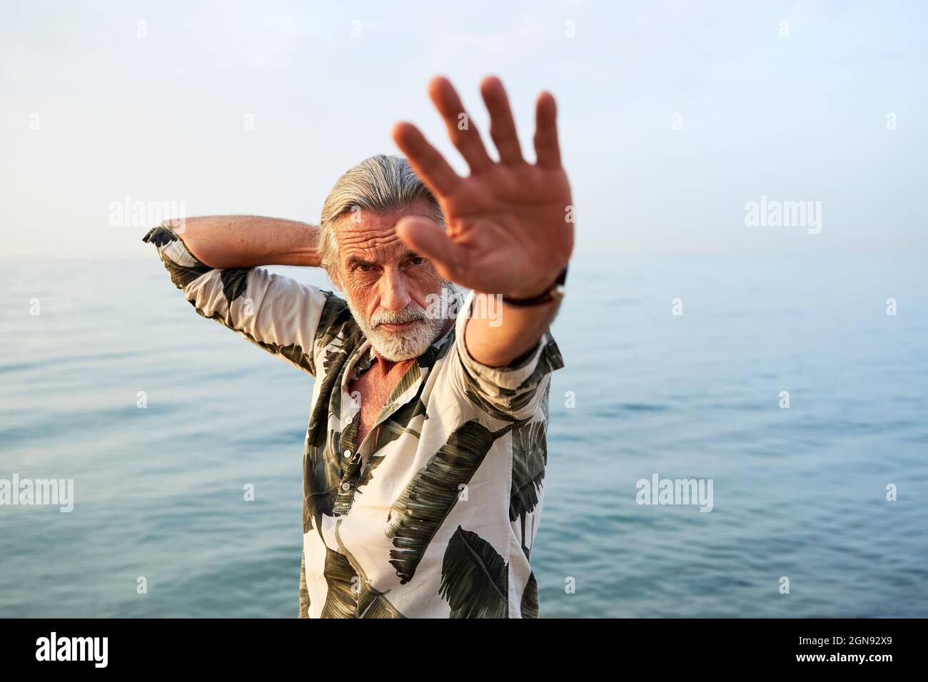 Man beach sea shirt hi-res stock photography and images - Alamy