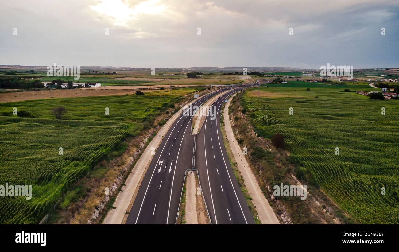 Aerial view of countryside highway at dusk Stock Photo - Alamy