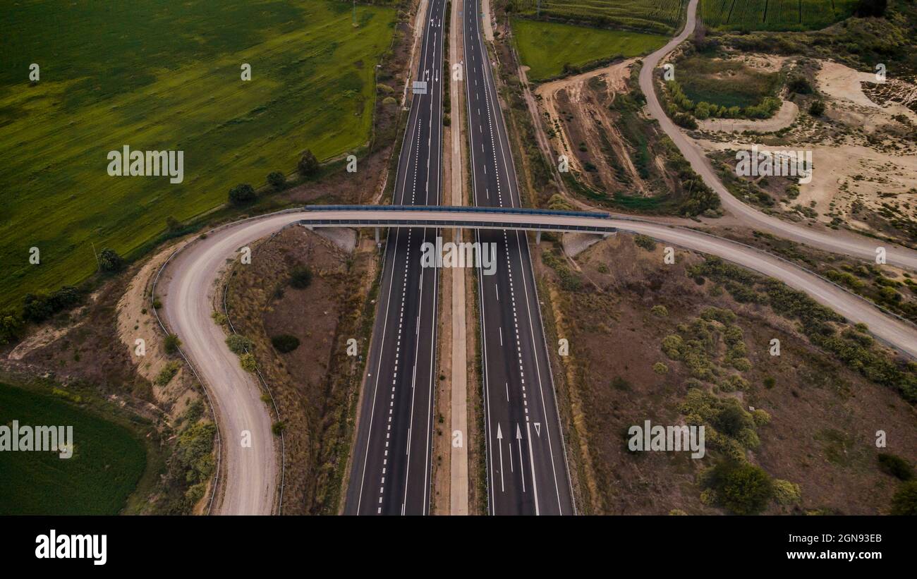 Aerial view of overpass stretching over countryside highway Stock Photo ...