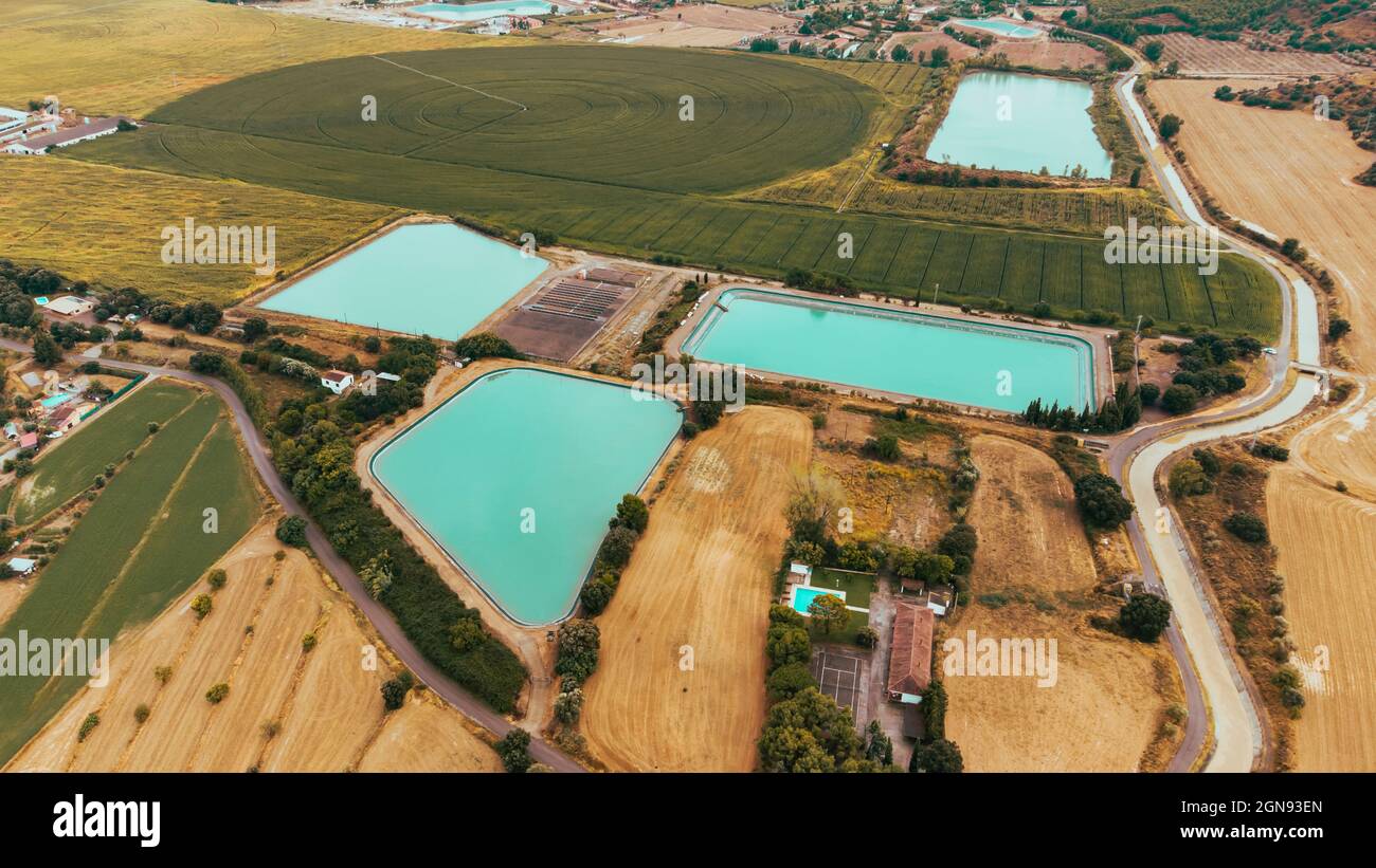 Aerial view of turquoise ponds surrounded by agricultural fields Stock ...