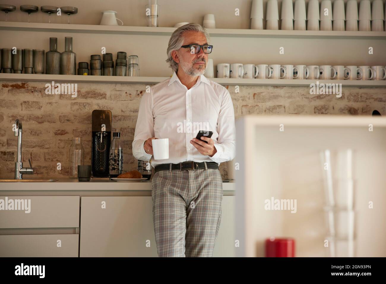 Office kitchen during coffee hi-res stock photography and images - Alamy