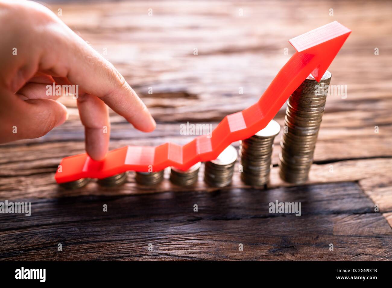 Man climbing bar chart hi-res stock photography and images - Alamy