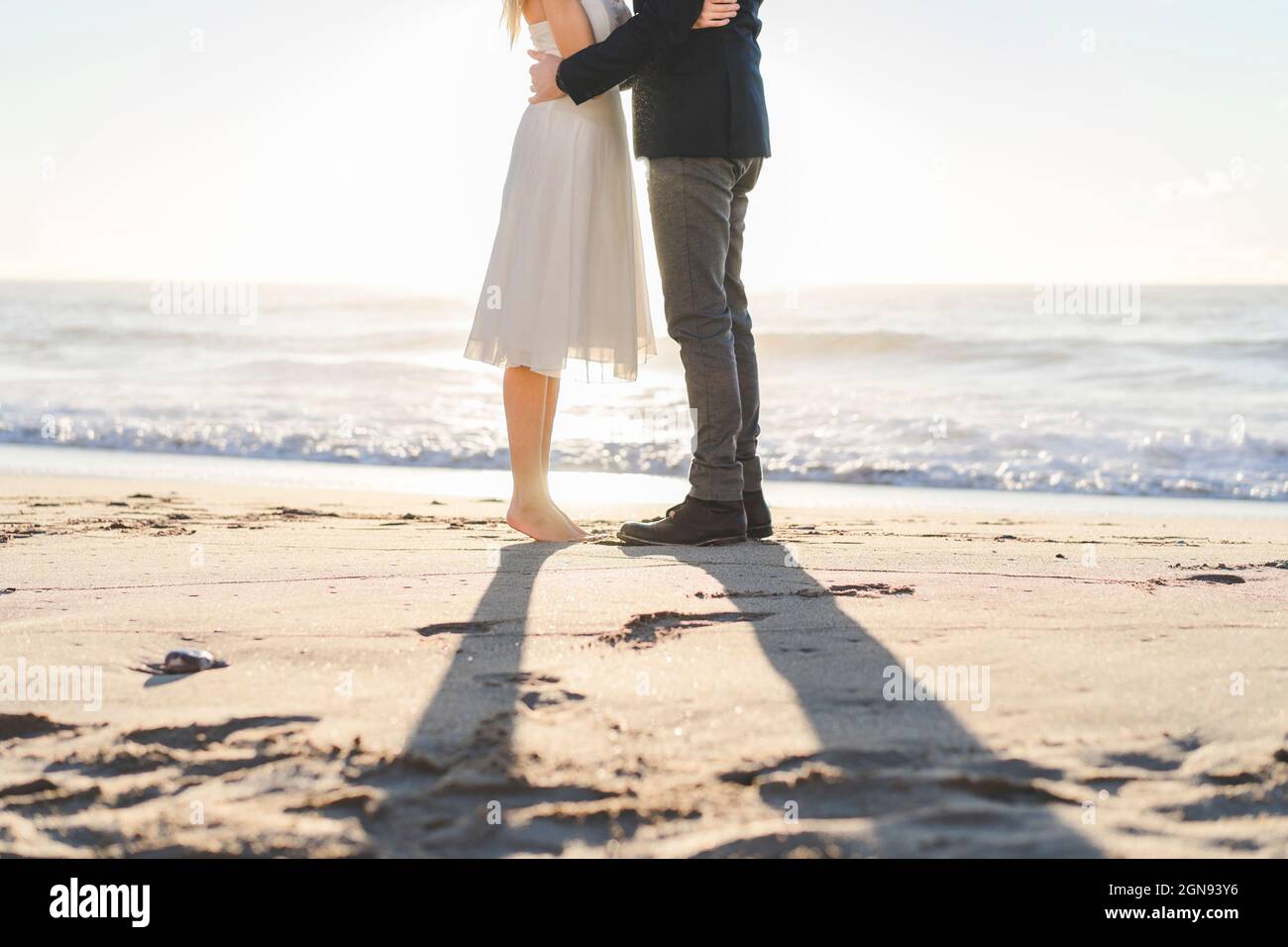 Bride groom embracing sea hi-res stock photography and images - Alamy