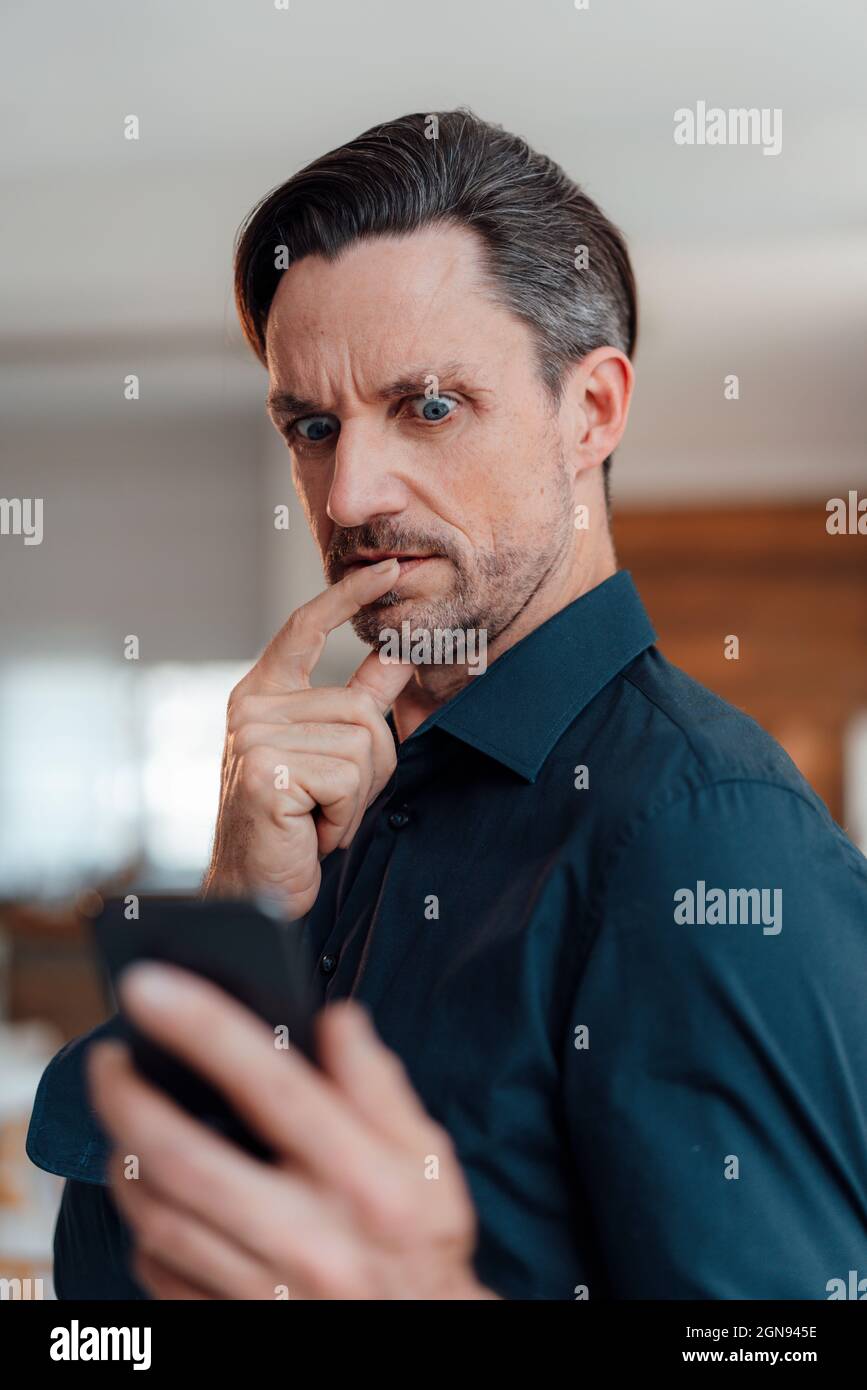Smart mature man hi-res stock photography and images - Alamy