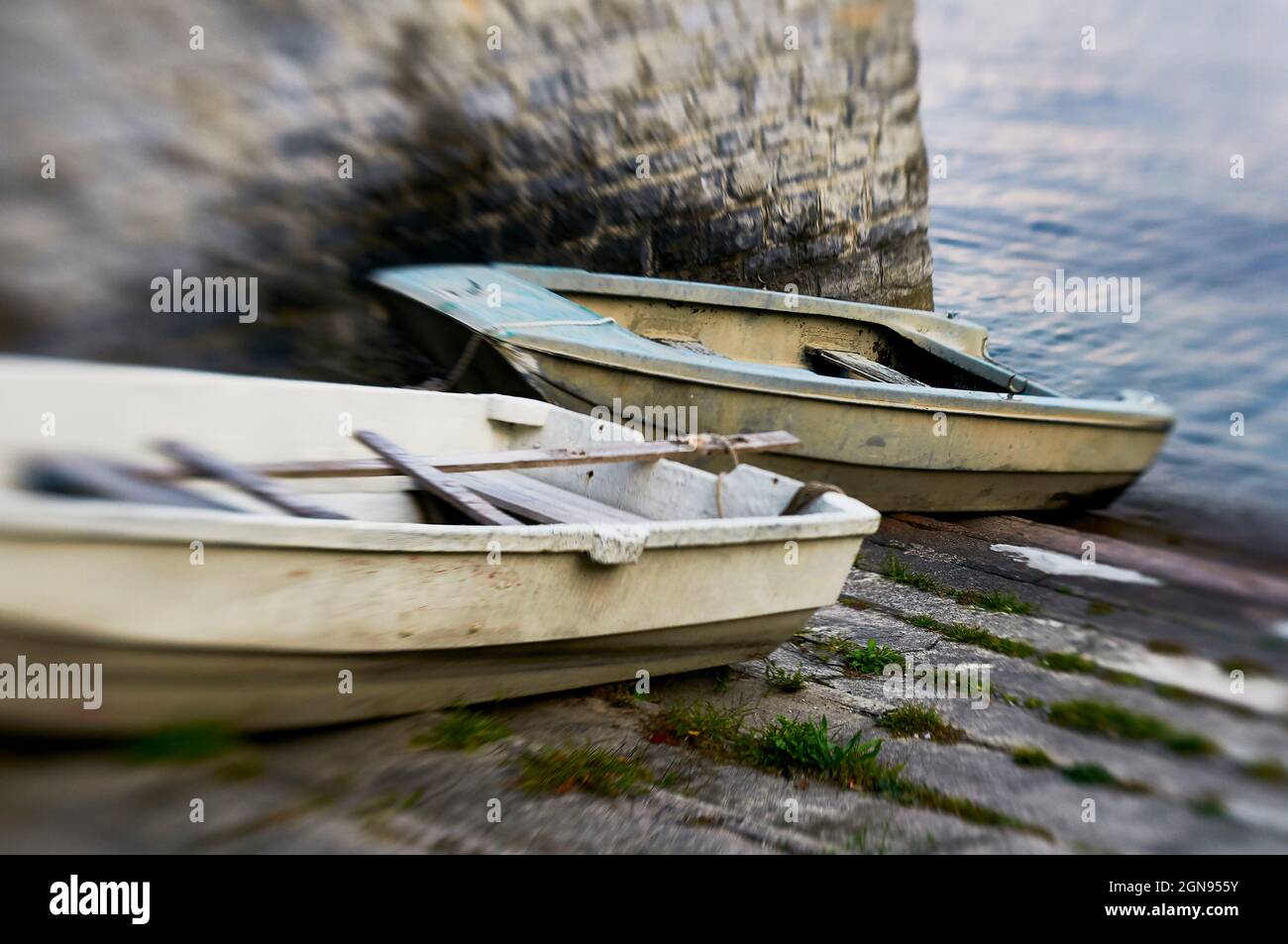 Two small boats at a slipway in Lake Como, Italy Stock Photo - Alamy