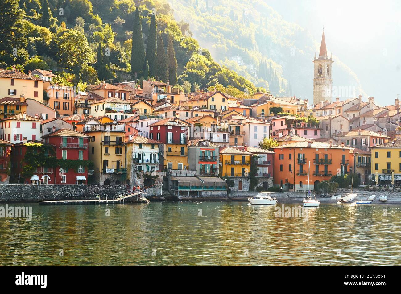 View of the Riva Grande in Varenna, Italy with Fishermen on dock Stock ...