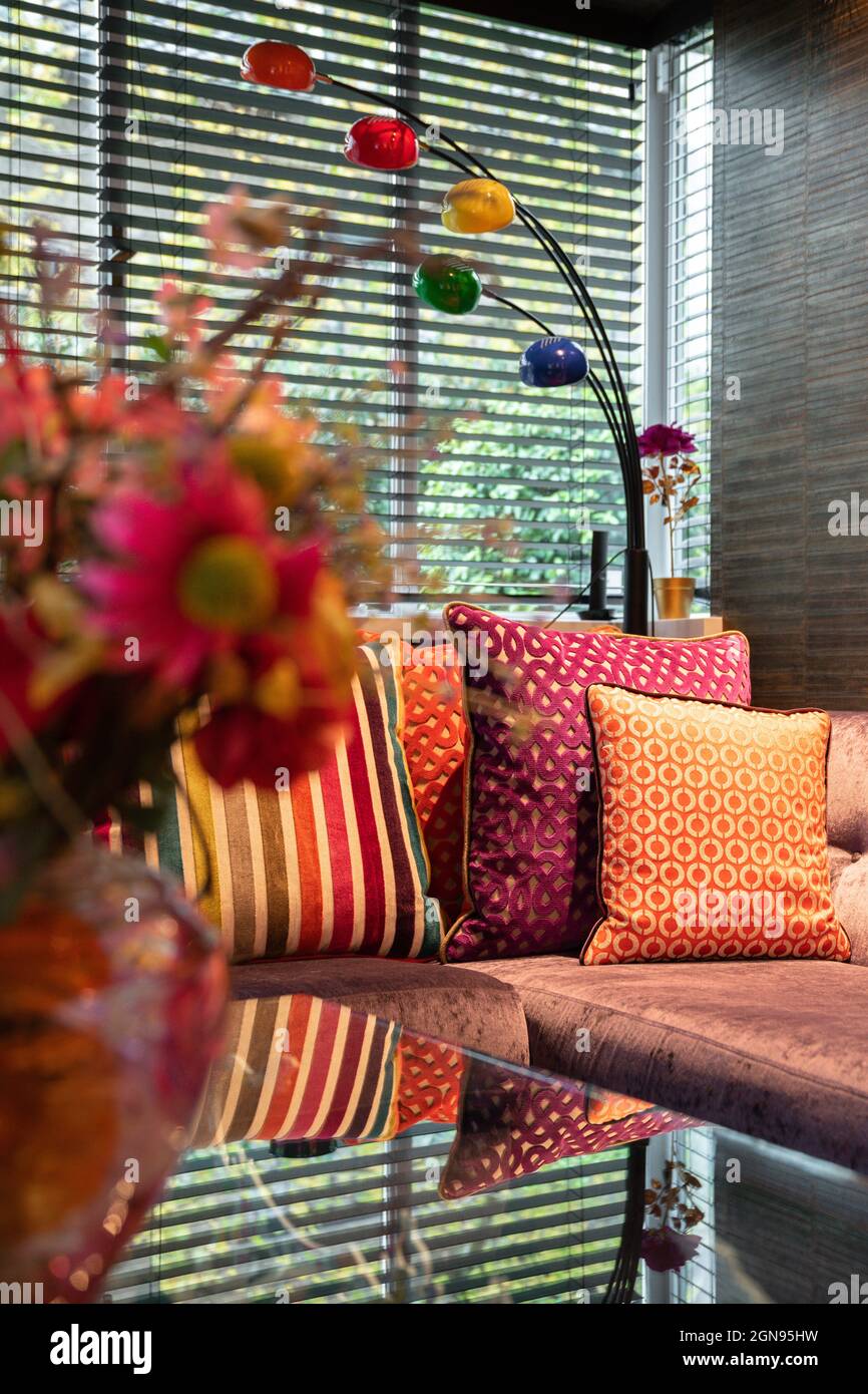 Colorful living room interior with decorative details Stock Photo - Alamy