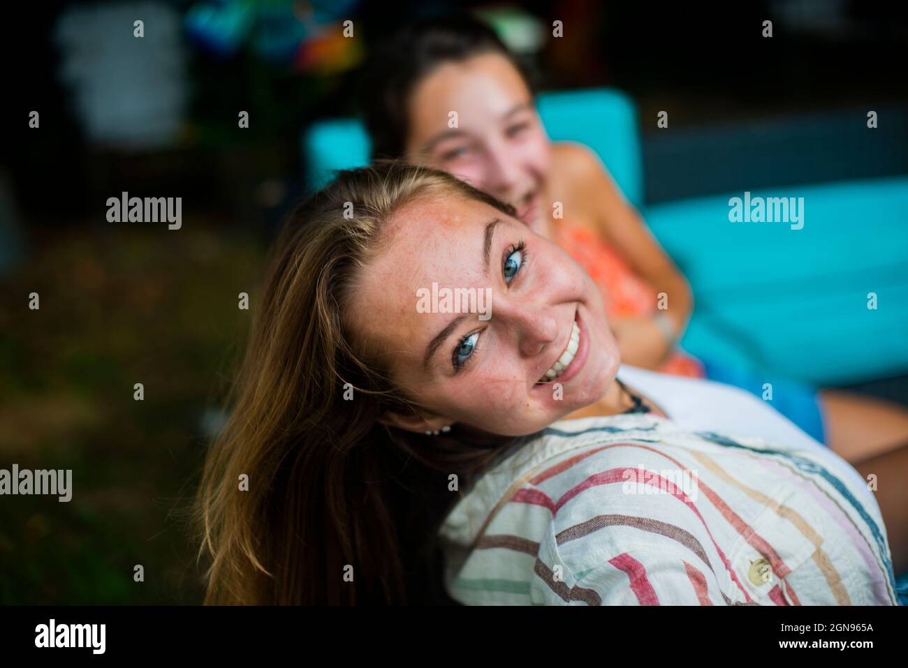 Backyard boho portrait of friends Stock Photo - Alamy