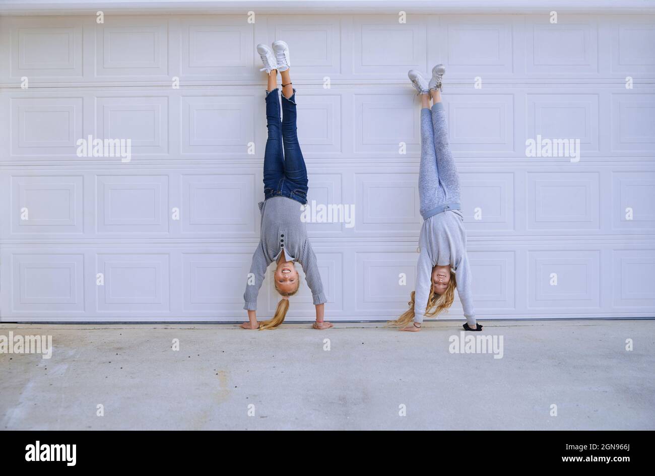 Girl doing handstand hi-res stock photography and images - Alamy