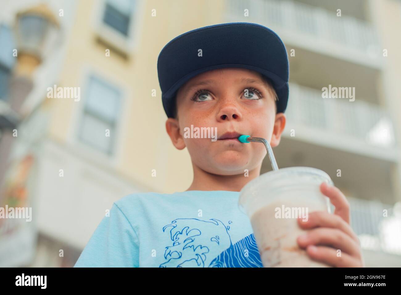 Boy drinking milkshake hi-res stock photography and images - Alamy