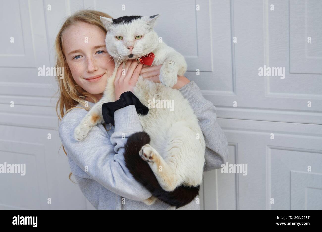Hugging her cat hi-res stock photography and images - Alamy