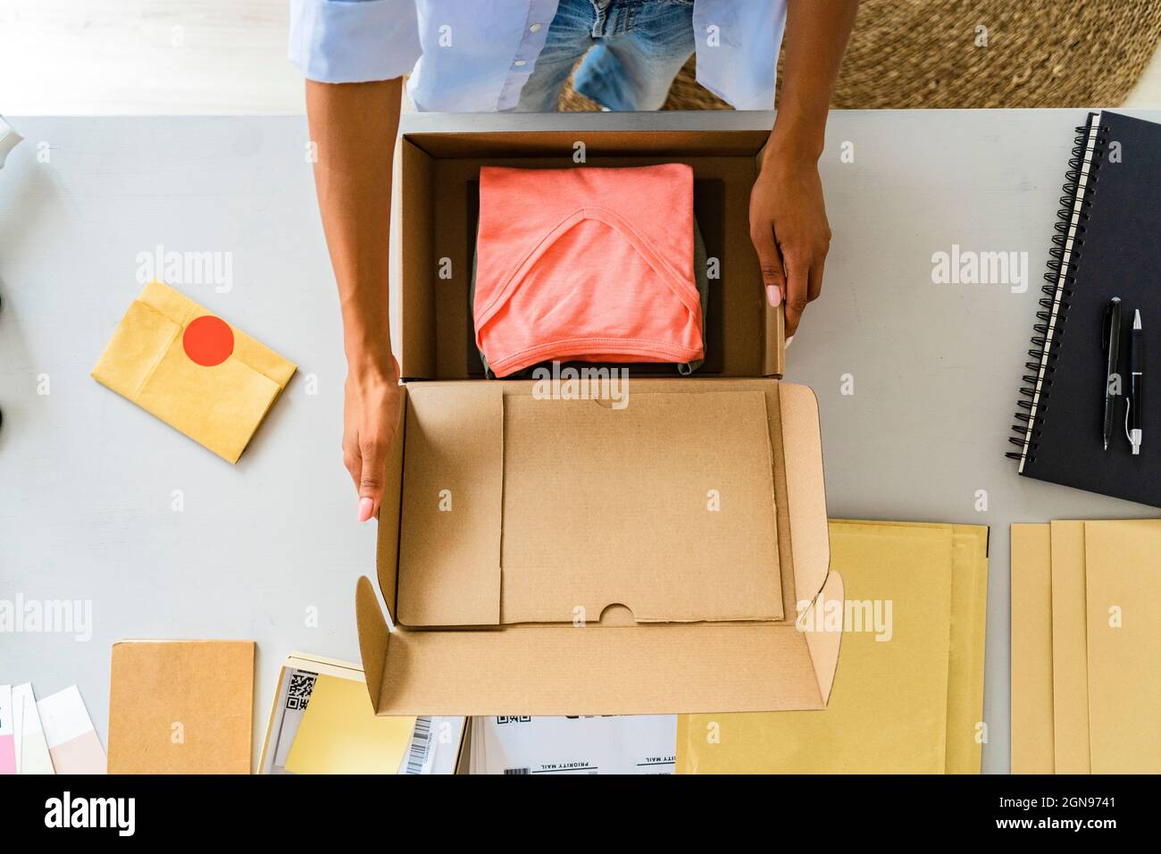 Delivering dress hi-res stock photography and images - Alamy