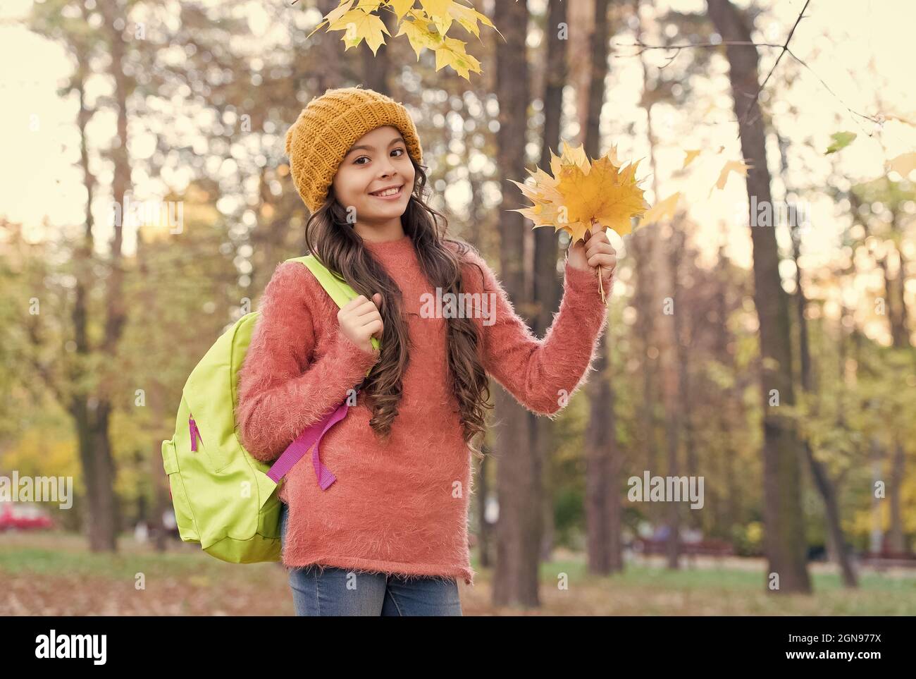 back to school. childhood happiness. beauty of fall nature. happy kid ...