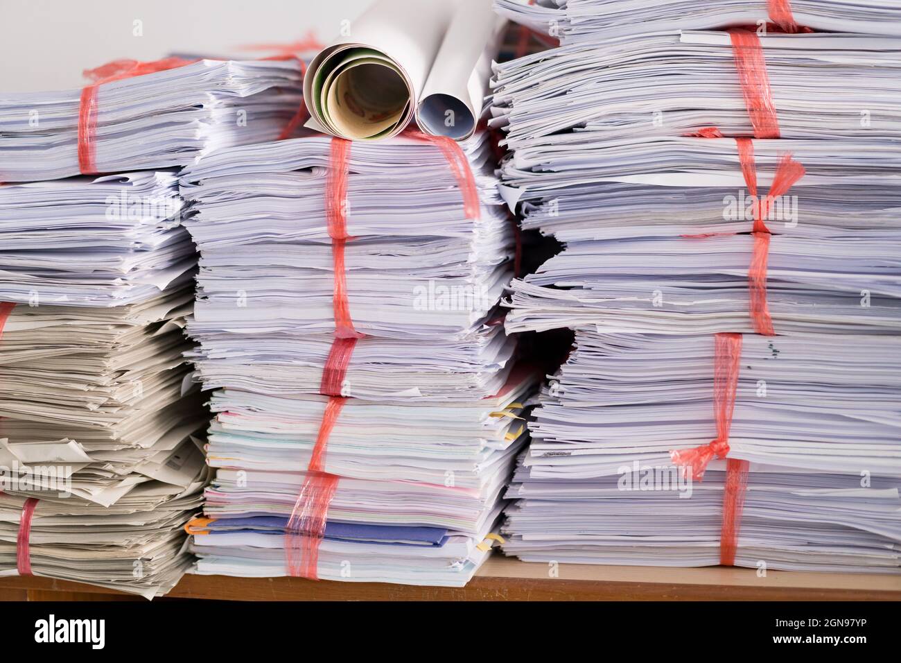 Stack of used paper and old documents packed and ready to be sent out ...