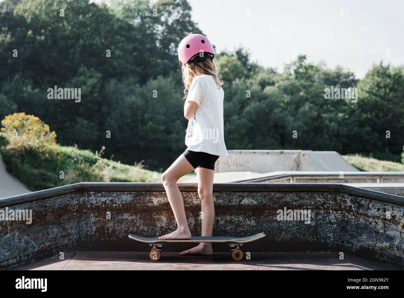 girl skateboarding at a skate park in summer in the UK Stock Photo - Alamy