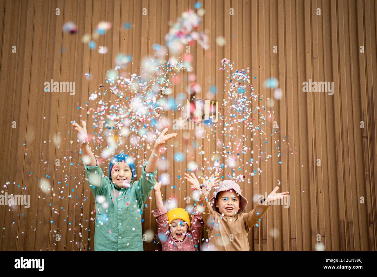 Girl throwing confetti hi-res stock photography and images - Alamy