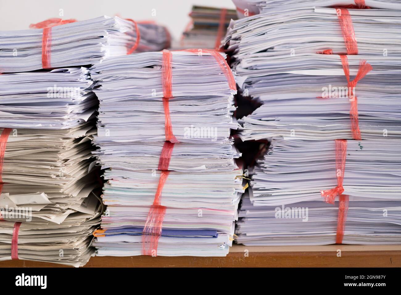 Stack of used paper and old documents packed and ready to be sent out ...