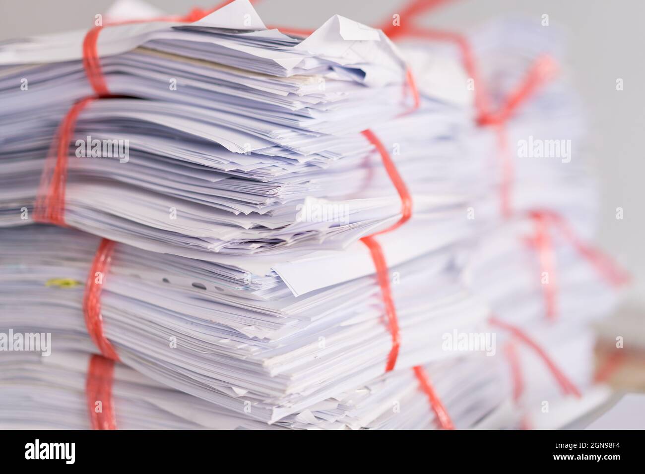 Stack of used paper and old documents packed and ready to be sent out ...