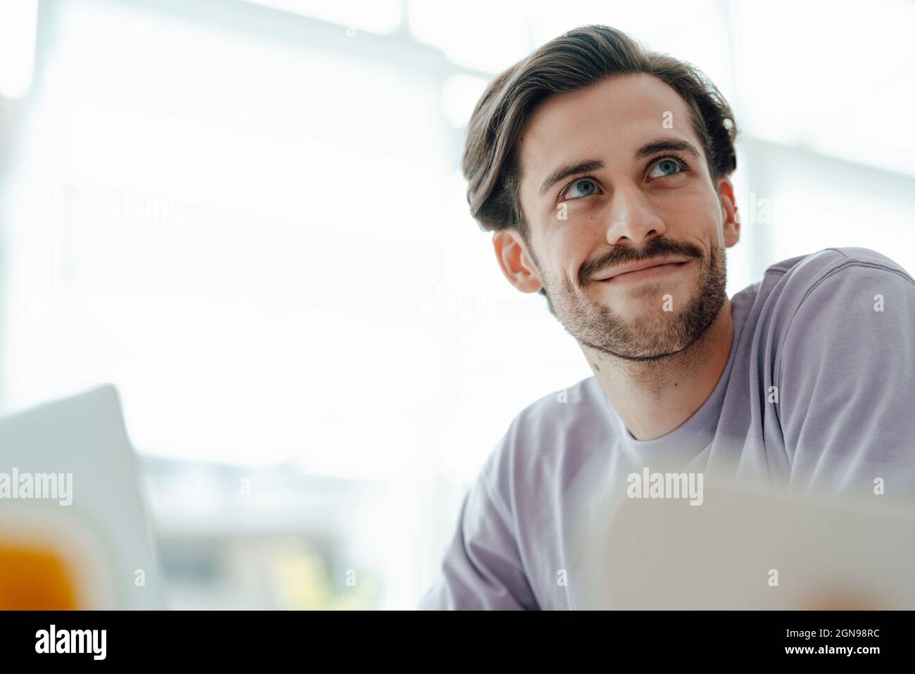 Young man laptop hi-res stock photography and images - Alamy