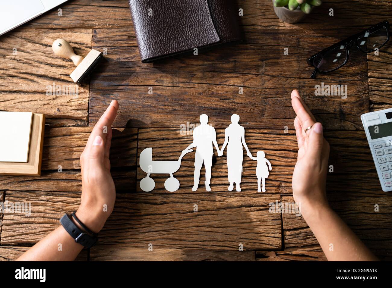 Family And Kid Protection. Parent Hand Safeguarding Stock Photo - Alamy