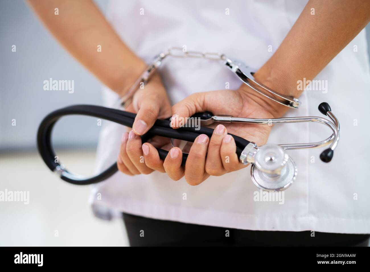 Woman in handcuffs hi-res stock photography and images - Alamy