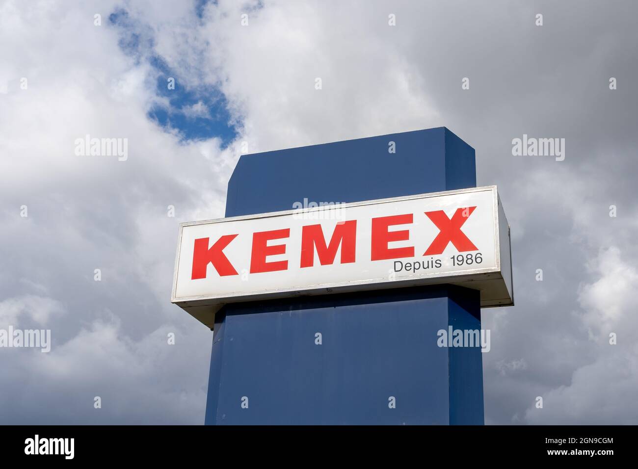 Dorval, Quebec, Canada - September 3, 2021: Close up of Kemex sign with sky in background in ...