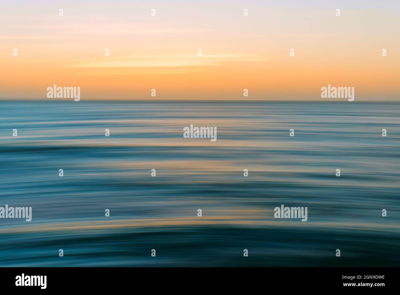 Sunset seascape abstract in bright blue, cyan, yellow colors, motion ...