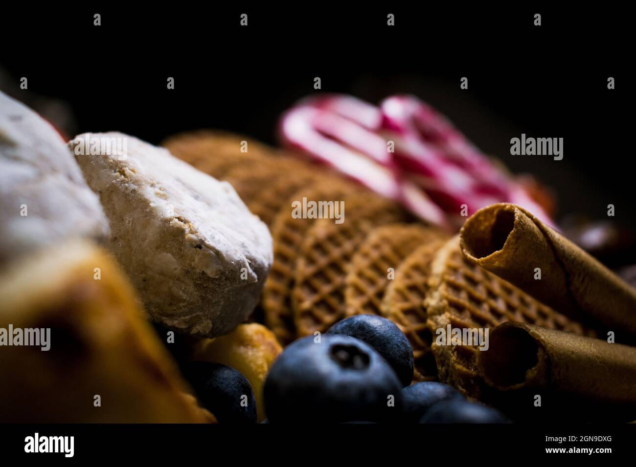 Soft focus of wafers and other sweets on display Stock Photo - Alamy