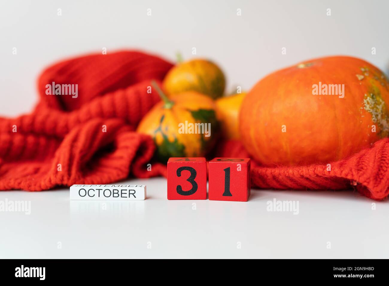 Wooden cube calendar showing Halloween October 31st, with pumpkins in ...