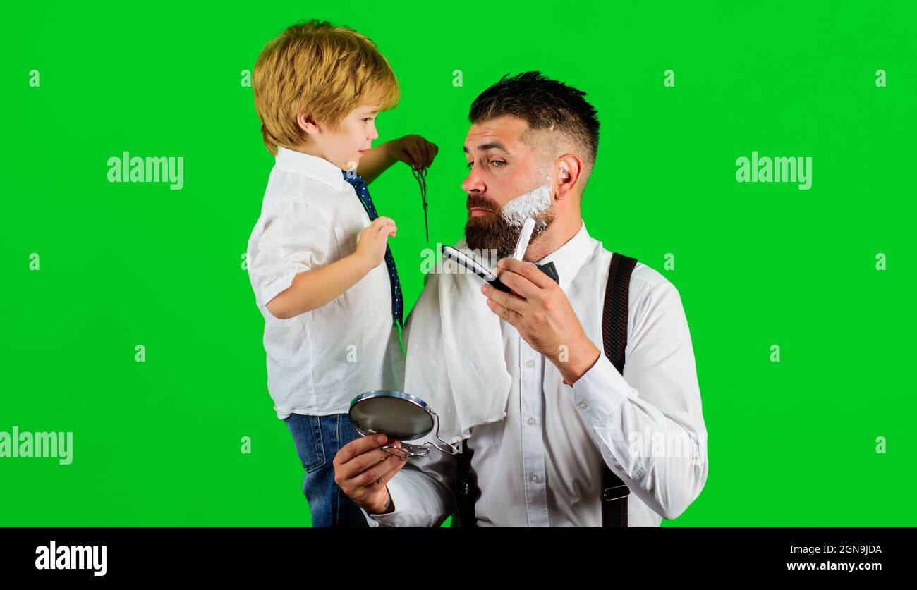 Barbershop advertising. Son and Father in barbershop. Assistant for dad ...