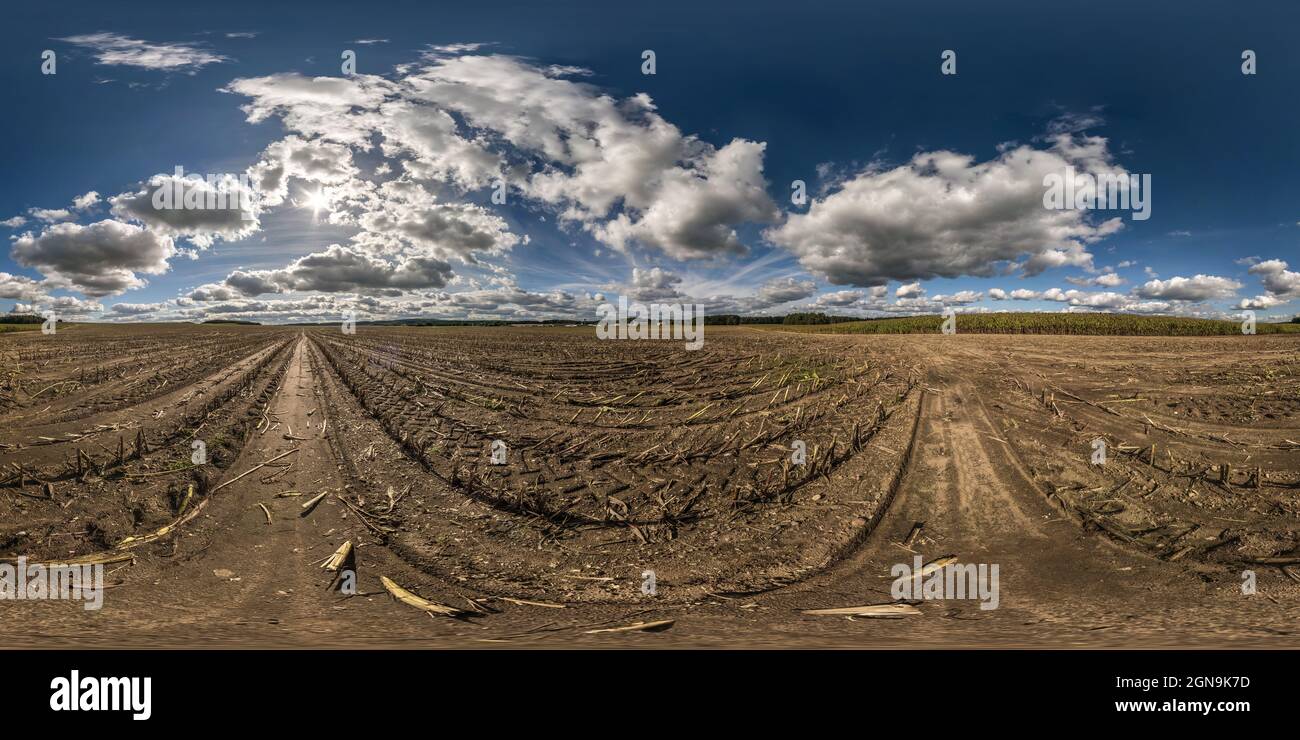 360 seamless hdri panorama view among plowed fields with white clouds ...