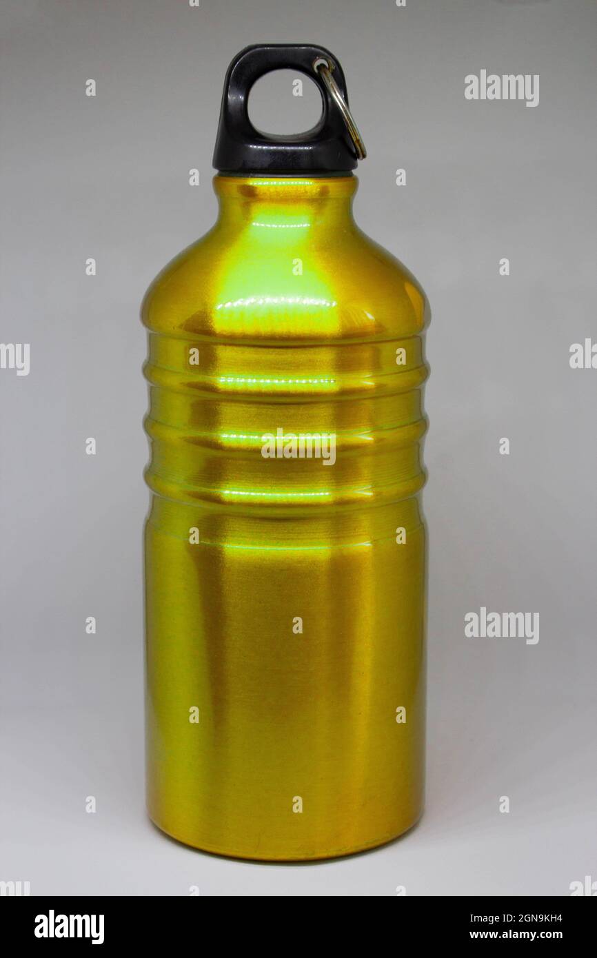 Orange and yellow flask on a white background. Thermos for campers ...